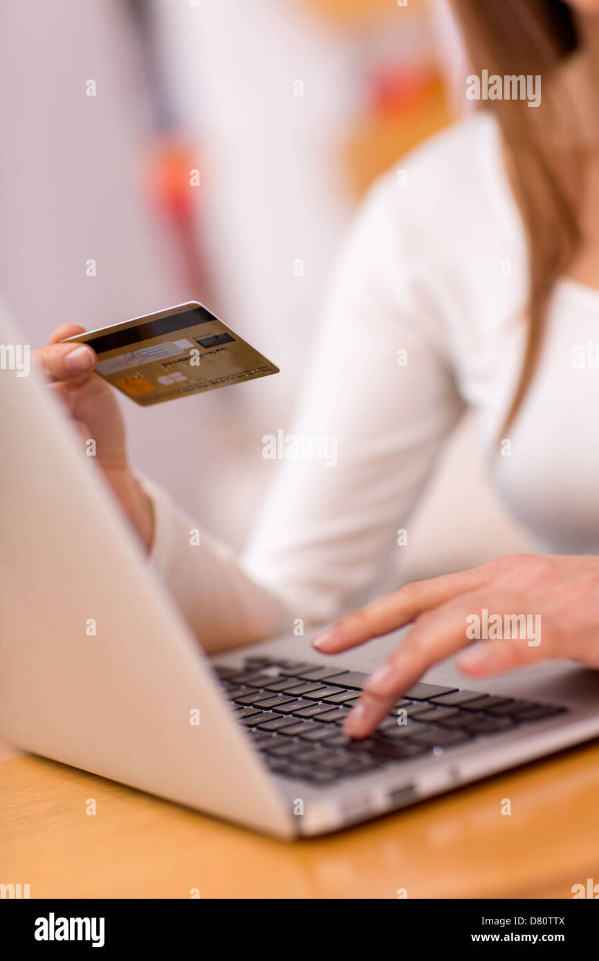 Female holding credit card hi-res stock photography and images - Alamy