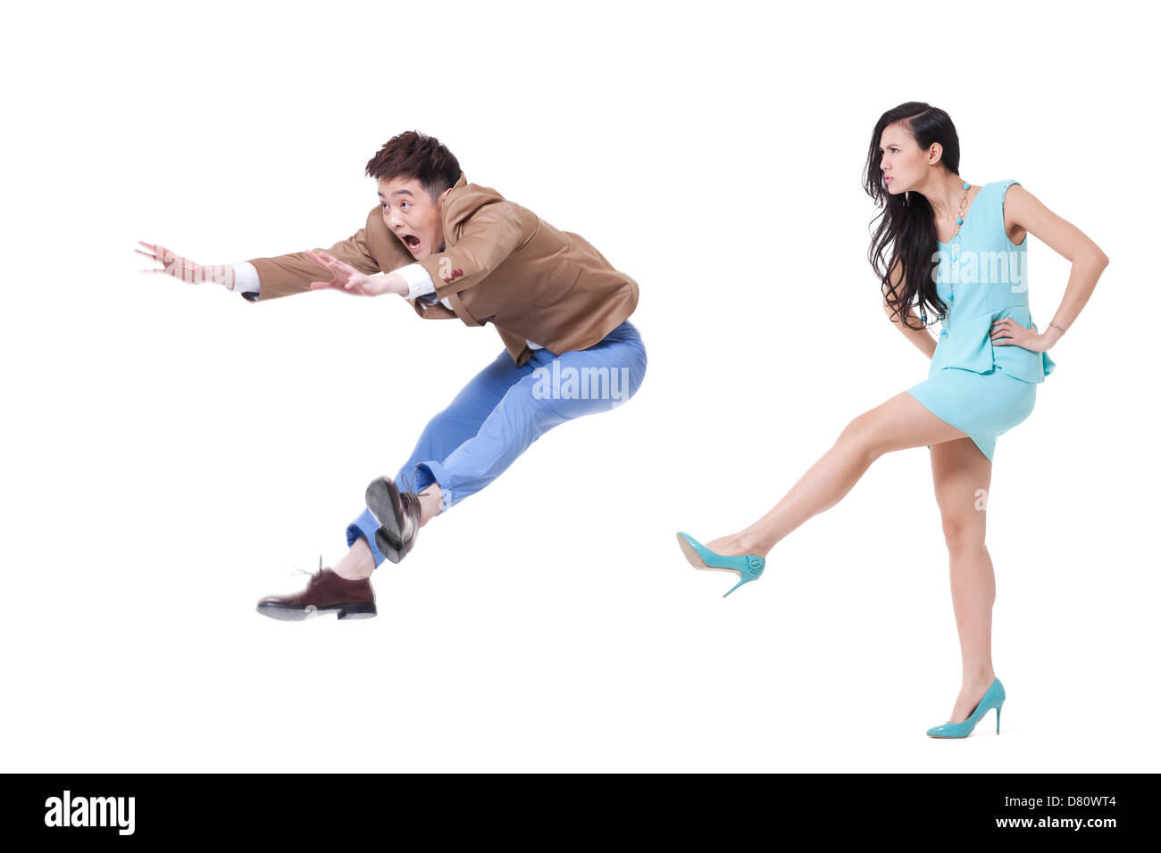 Fashionable young woman stepping forward Stock Photo - Alamy