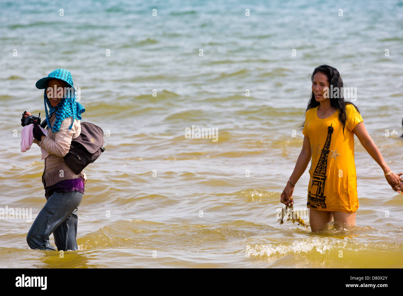 Cambodian Women in the Sea at Serendipity Beach in Sihanoukville ...