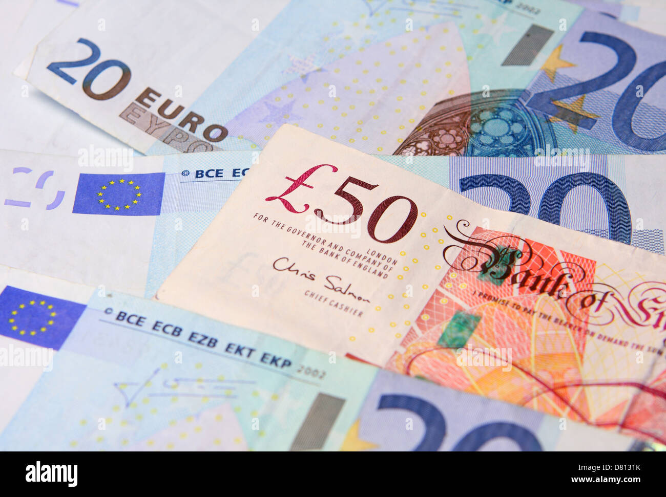 A £50 note amongst 20 Euro notes Stock Photo - Alamy
