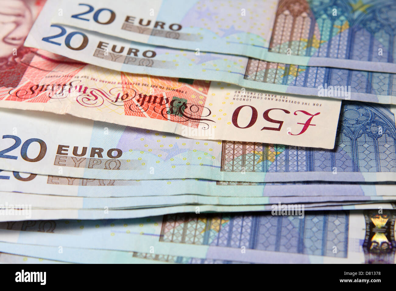 A £50 note amongst 20 Euro notes Stock Photo - Alamy