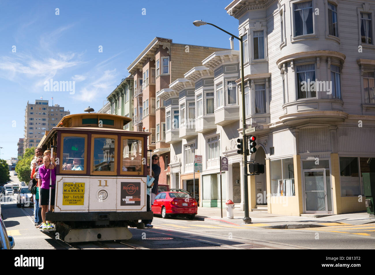 The number 11 travels down Mason Street crossing Pacific with a load of ...