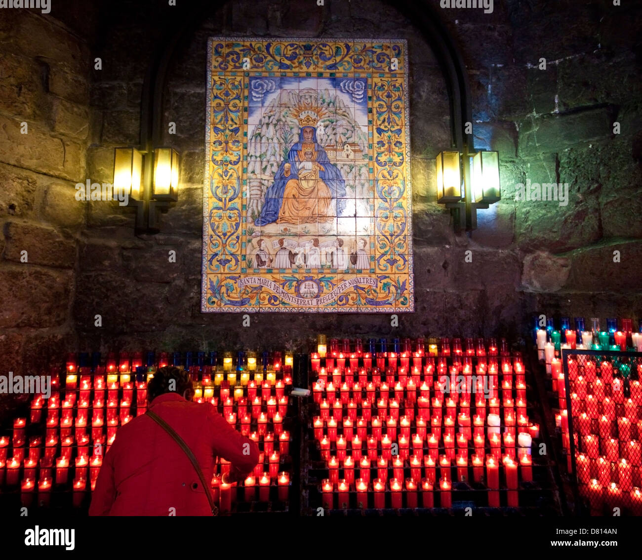 Person Lighting a Prayer Candle in Church Stock Photo - Alamy