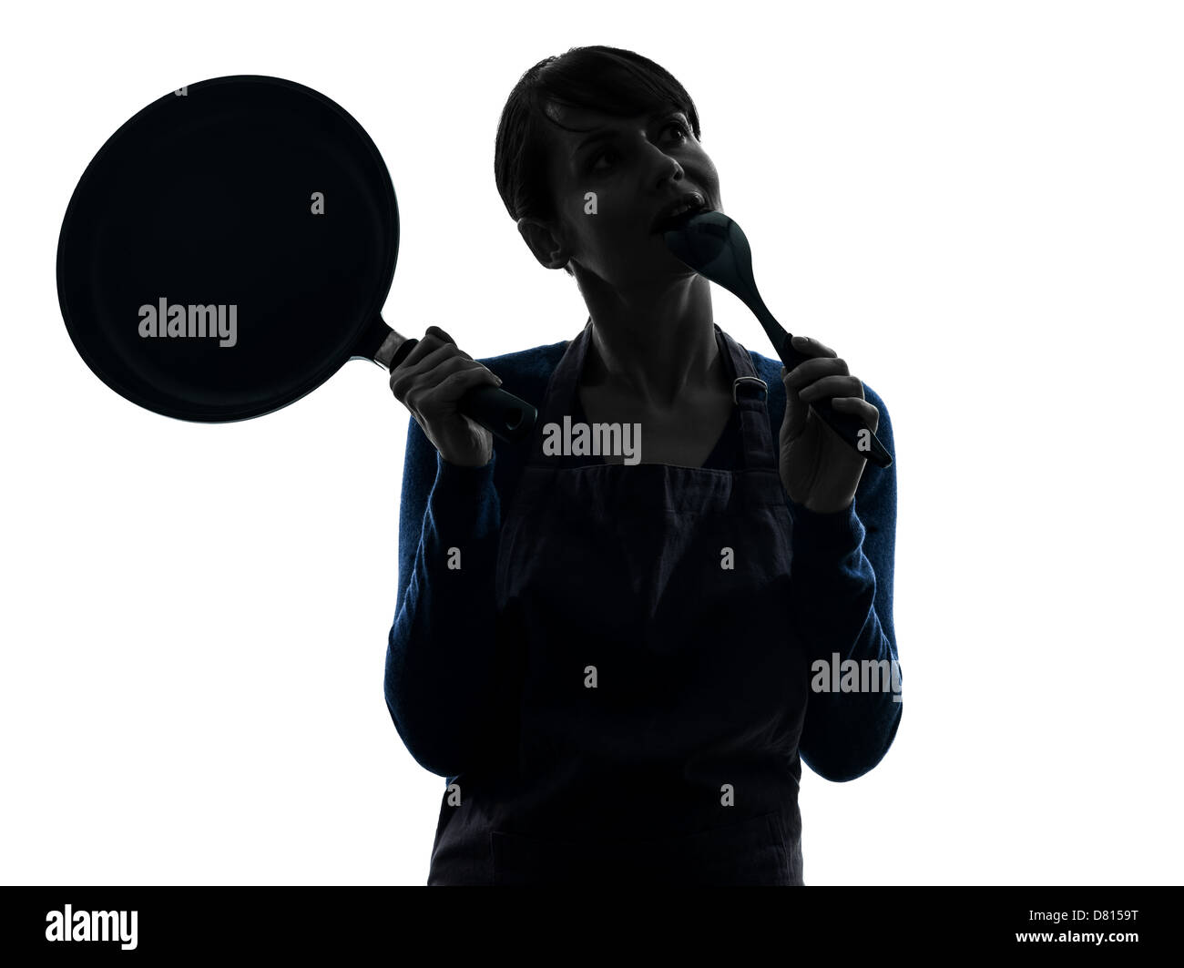 one woman cooking frying pan thinking in silhouette studio isolated on ...