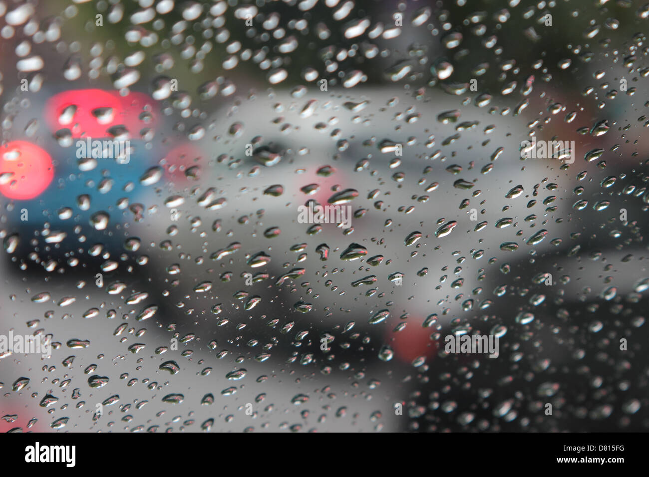 traffic-jam observed behind a window during a rainstorm Stock Photo - Alamy