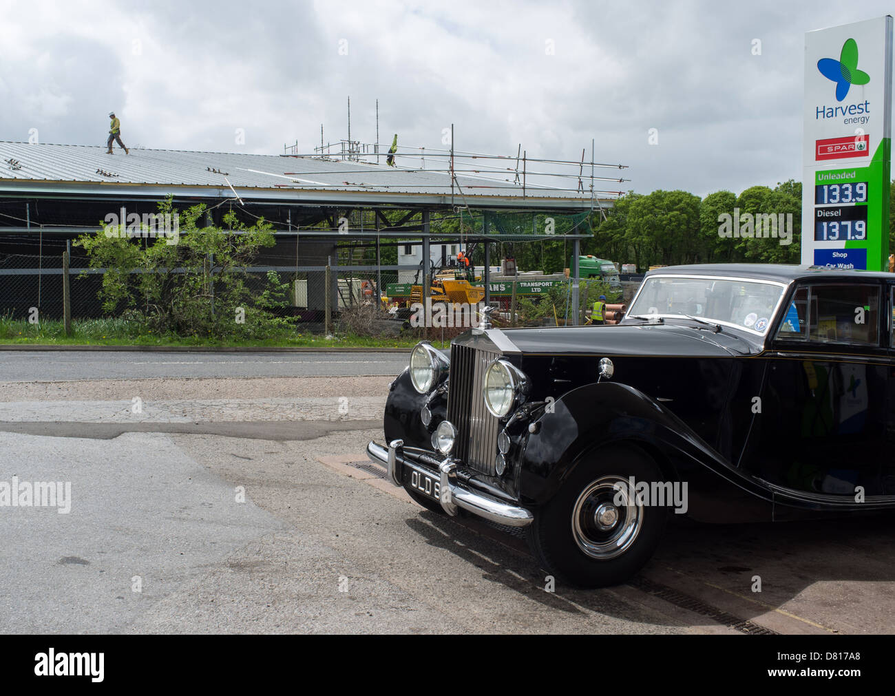 Honiton, Devon, England.Rolls Royce fill up with petrol, gas, at a ...