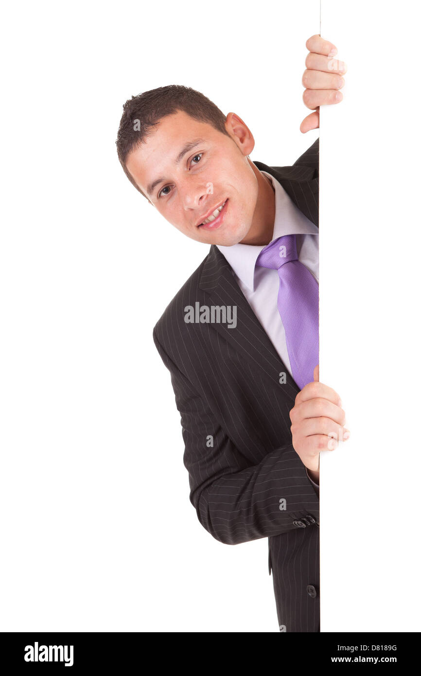 Young business man, behind white card Stock Photo - Alamy