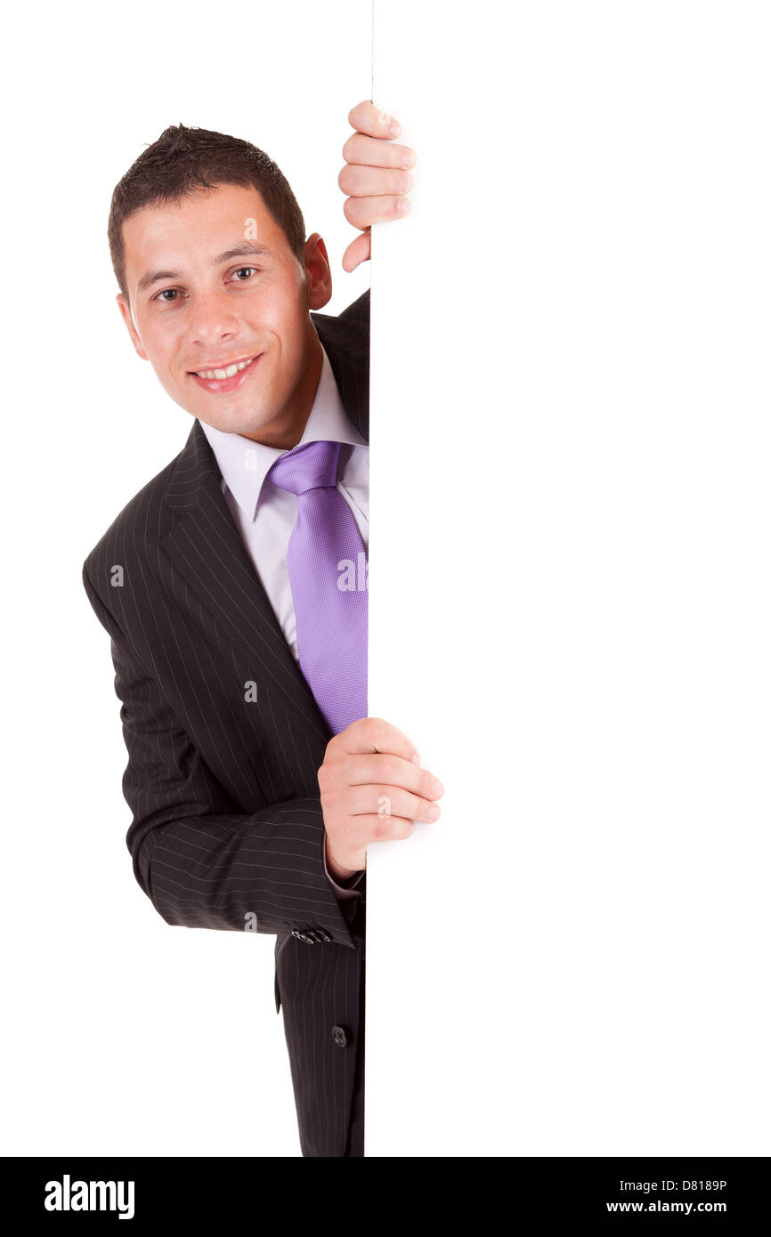 Young business man, behind white card Stock Photo - Alamy