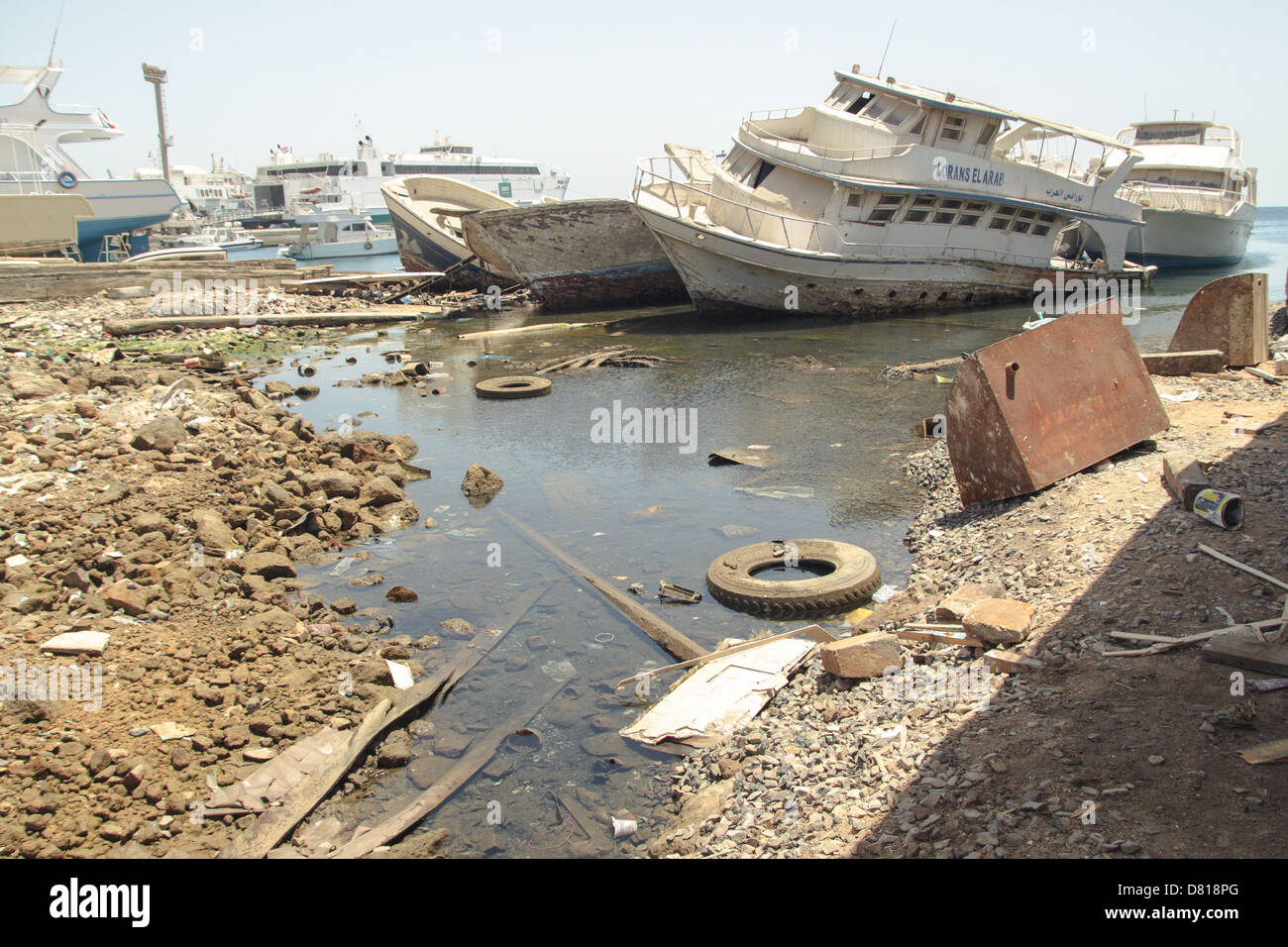 A sinking diving boat next to the drydock in Hurghada, Egypt Stock ...