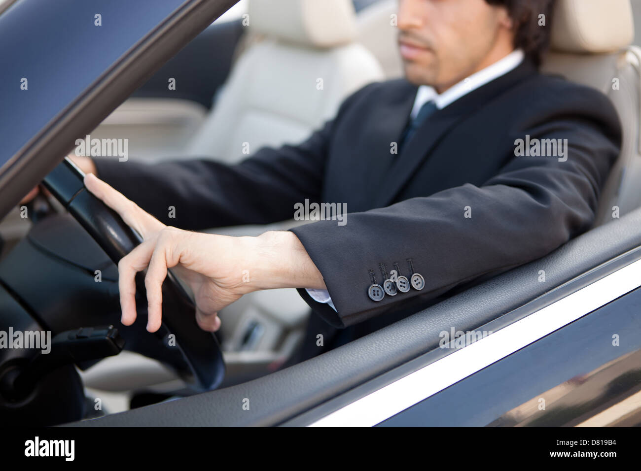 Young man in luxury sports car Stock Photo - Alamy