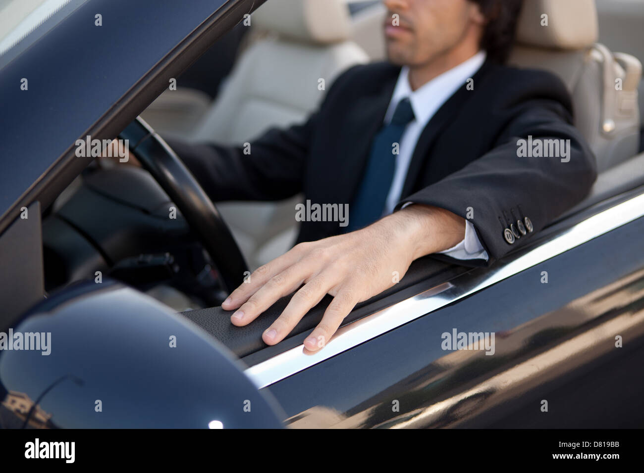 Young man in luxury sports car Stock Photo - Alamy