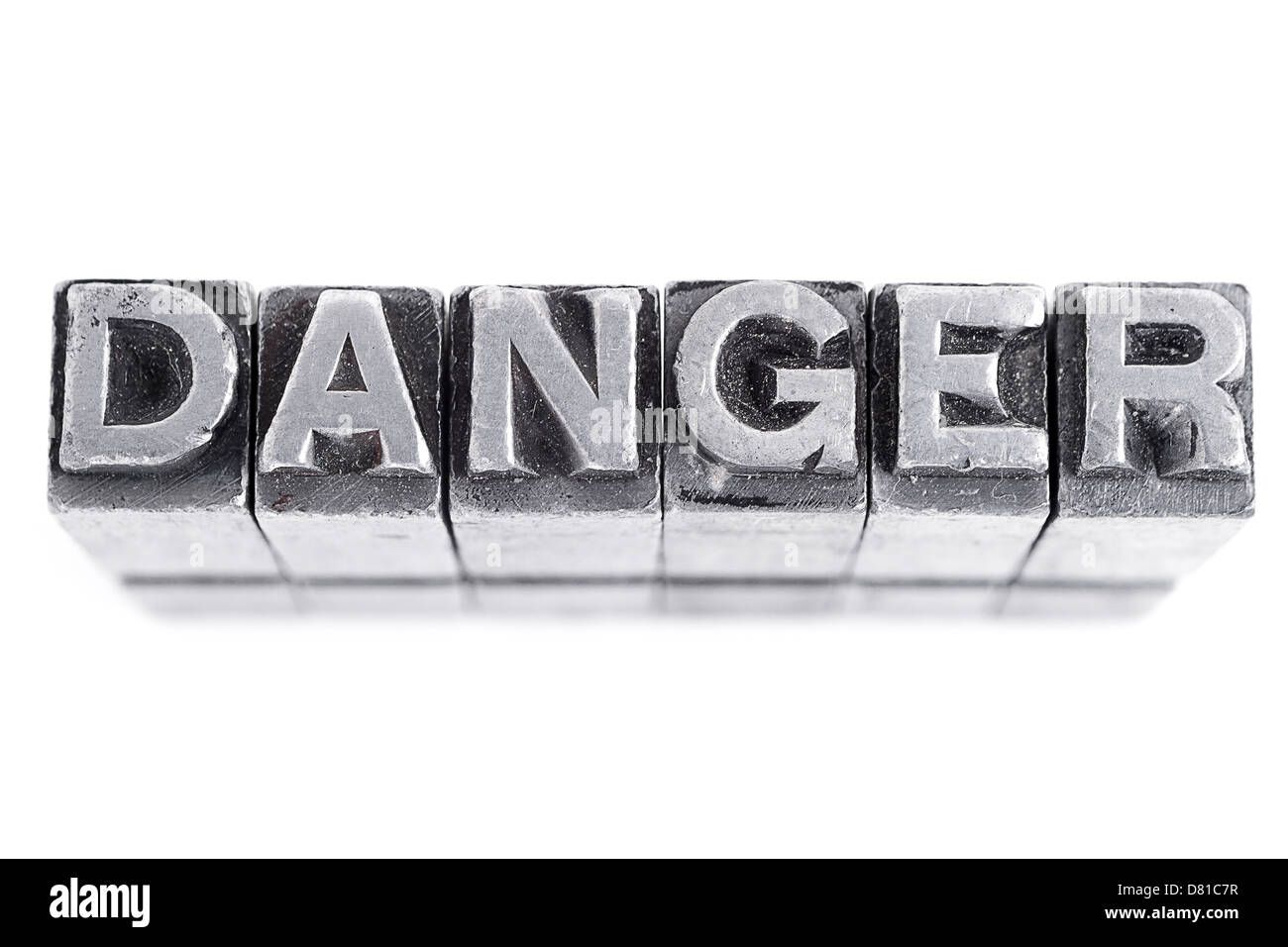 Danger sign, antique metal letter type Stock Photo - Alamy