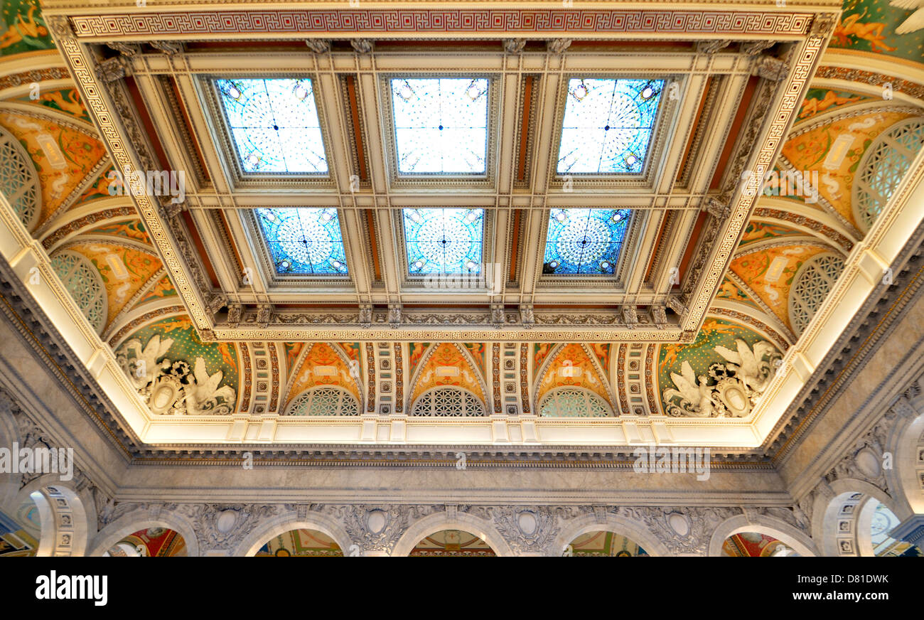 The main hall of the Library of Congress. The gilded ceiling is richly ...