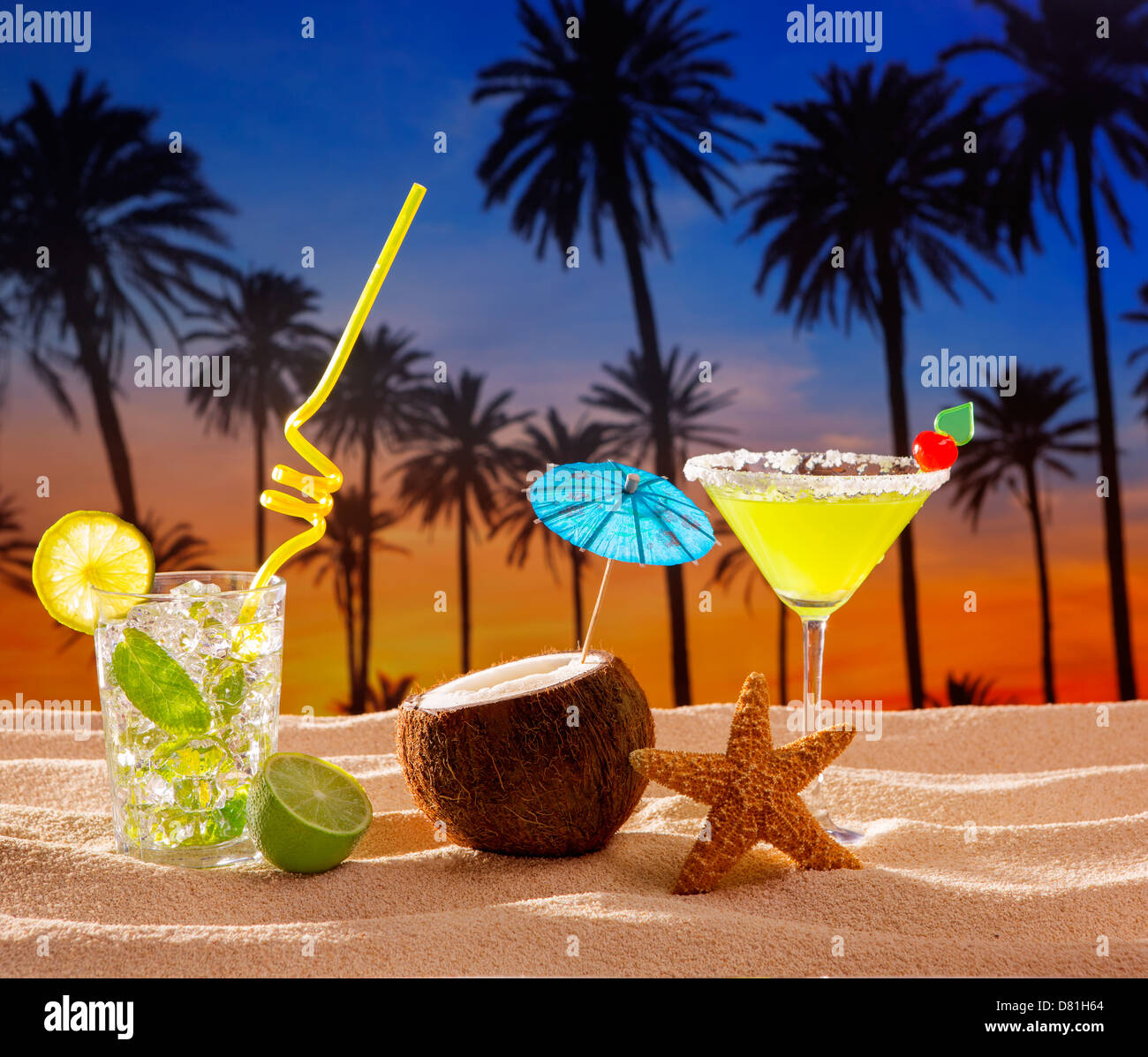 beach cocktail sunset on palm tree sand mojito margarita coconut Stock ...