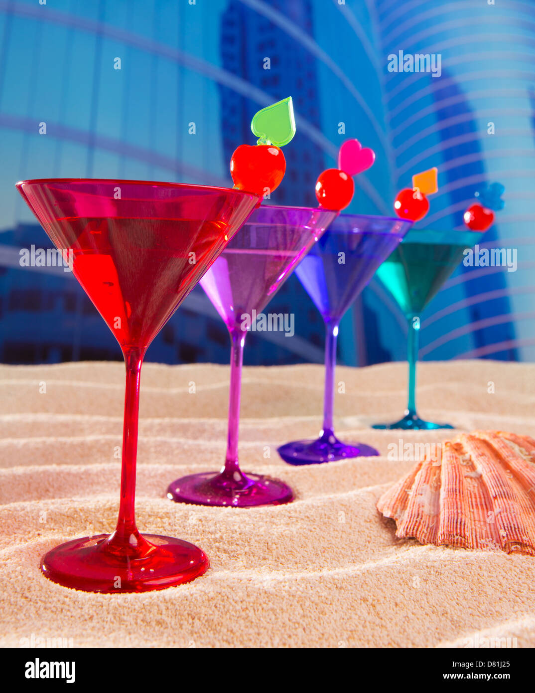 colorful cocktail in a row with cherry sand in urban city building ...