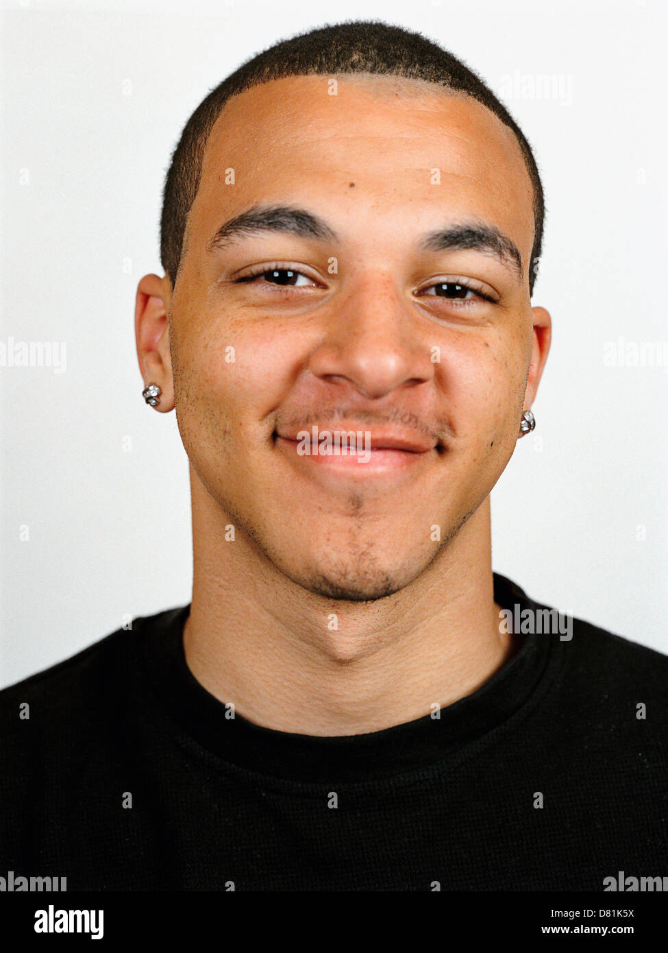 Mixed race man smiling Stock Photo - Alamy
