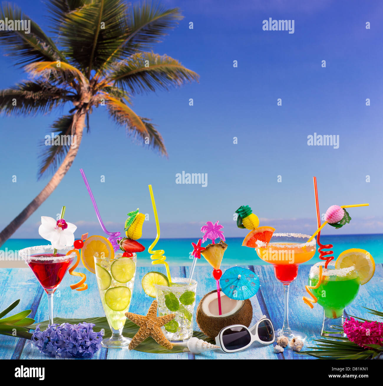 Beach colorful many tropical Cocktails in tropical blue wood with ...