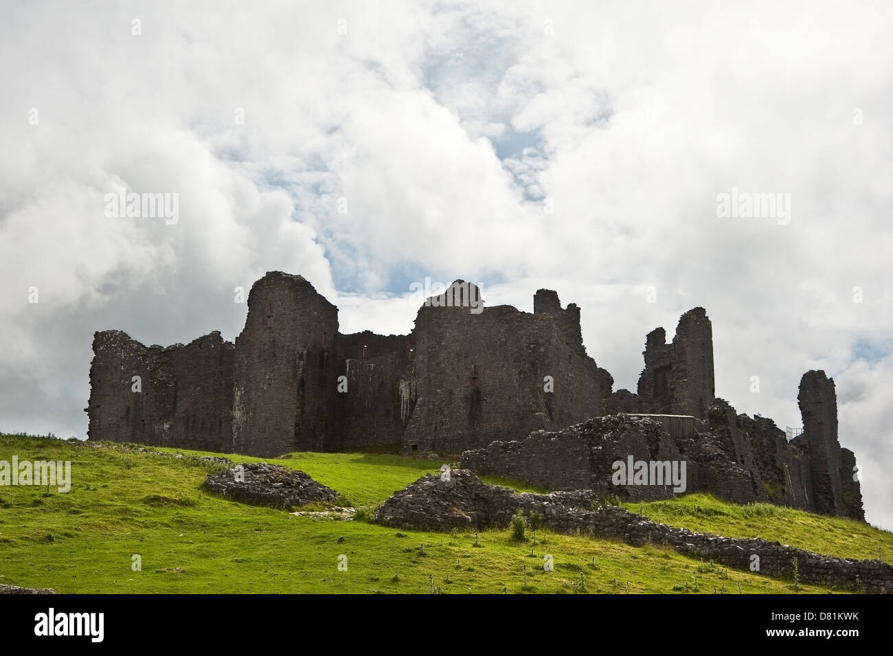 Beautiful image of medieval castle ruins in landscape with moody sky ...