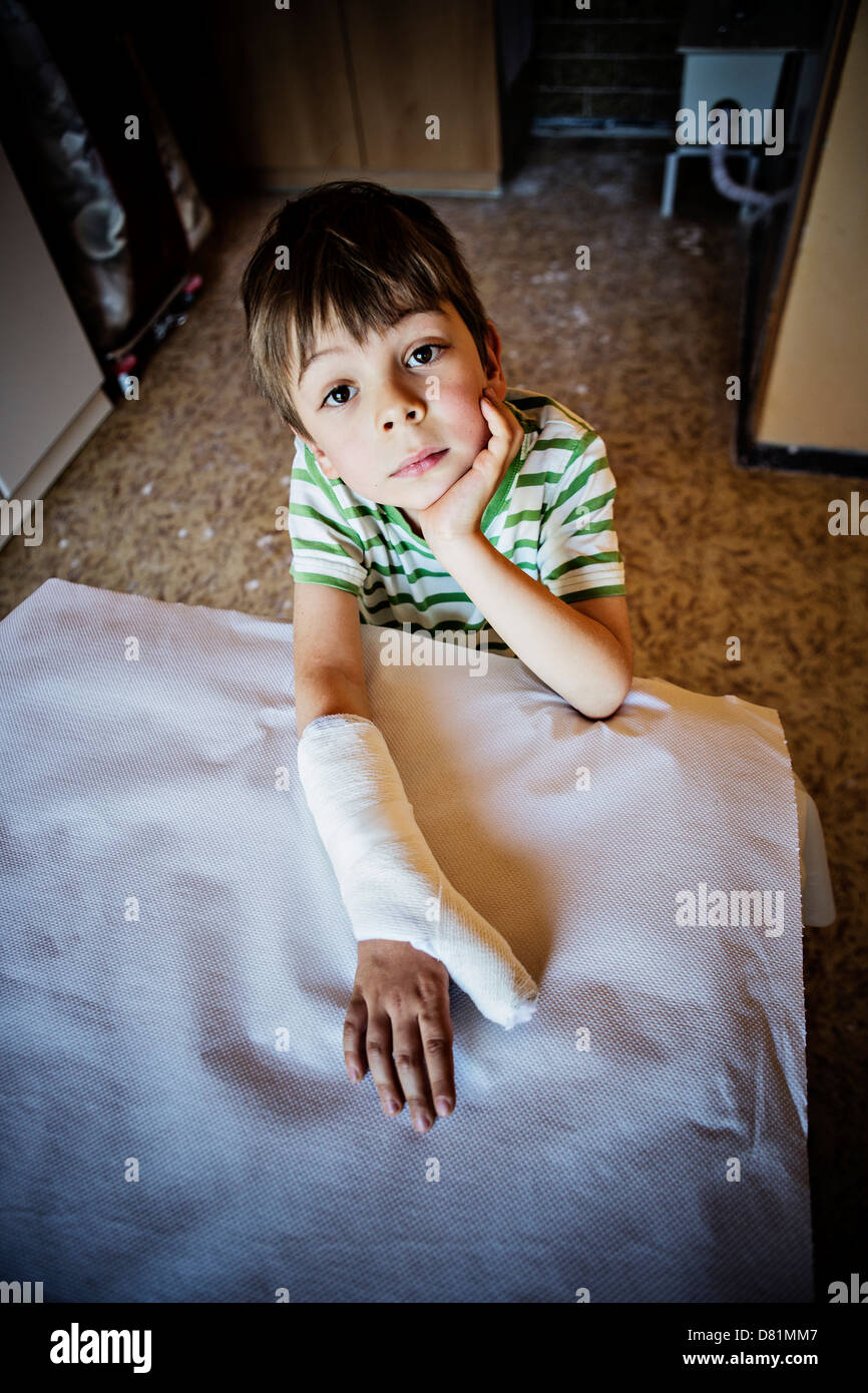child kid boy accident injury broken bone arm hand plaster treatment ...