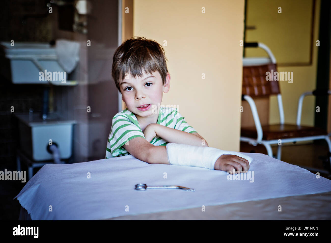 child kid boy accident injury broken bone arm hand plaster treatment ...