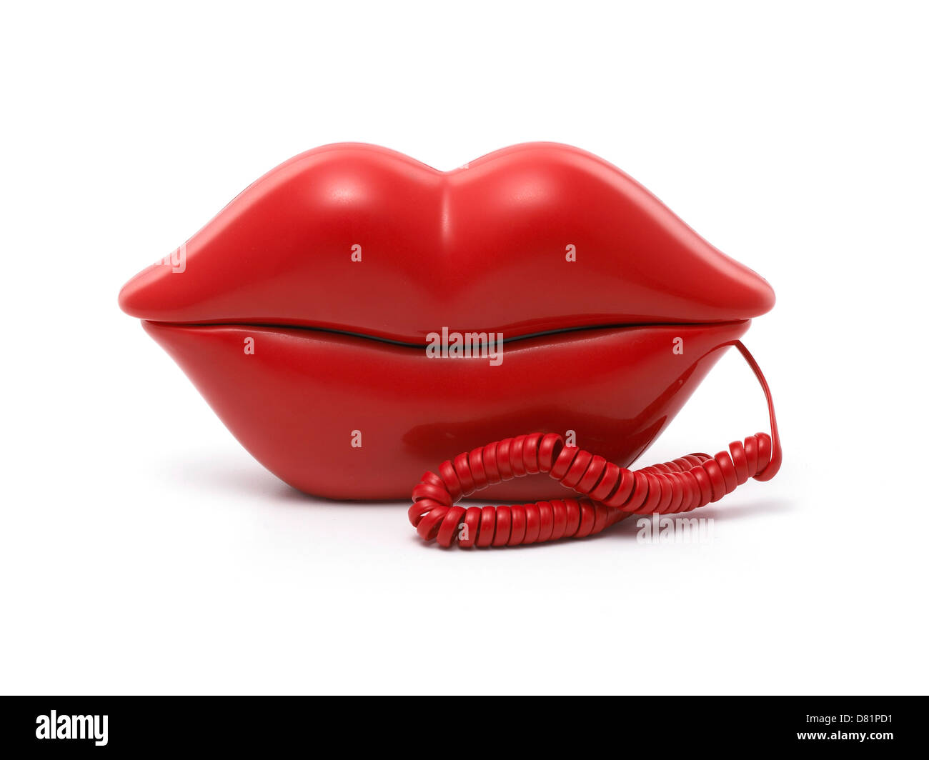 red lips telephone cut out onto a white background Stock Photo - Alamy