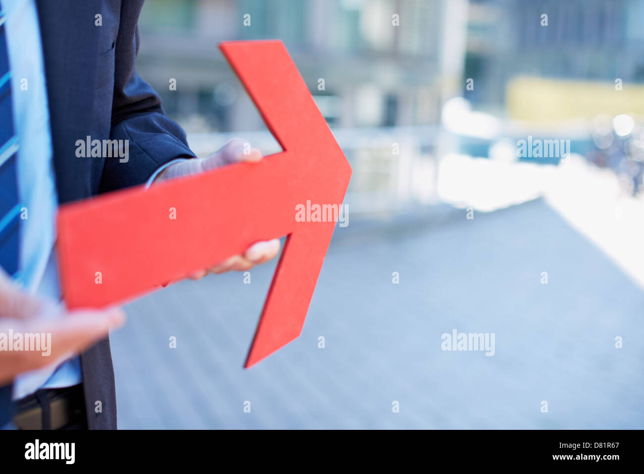 Businessman arrow sign hi-res stock photography and images - Alamy