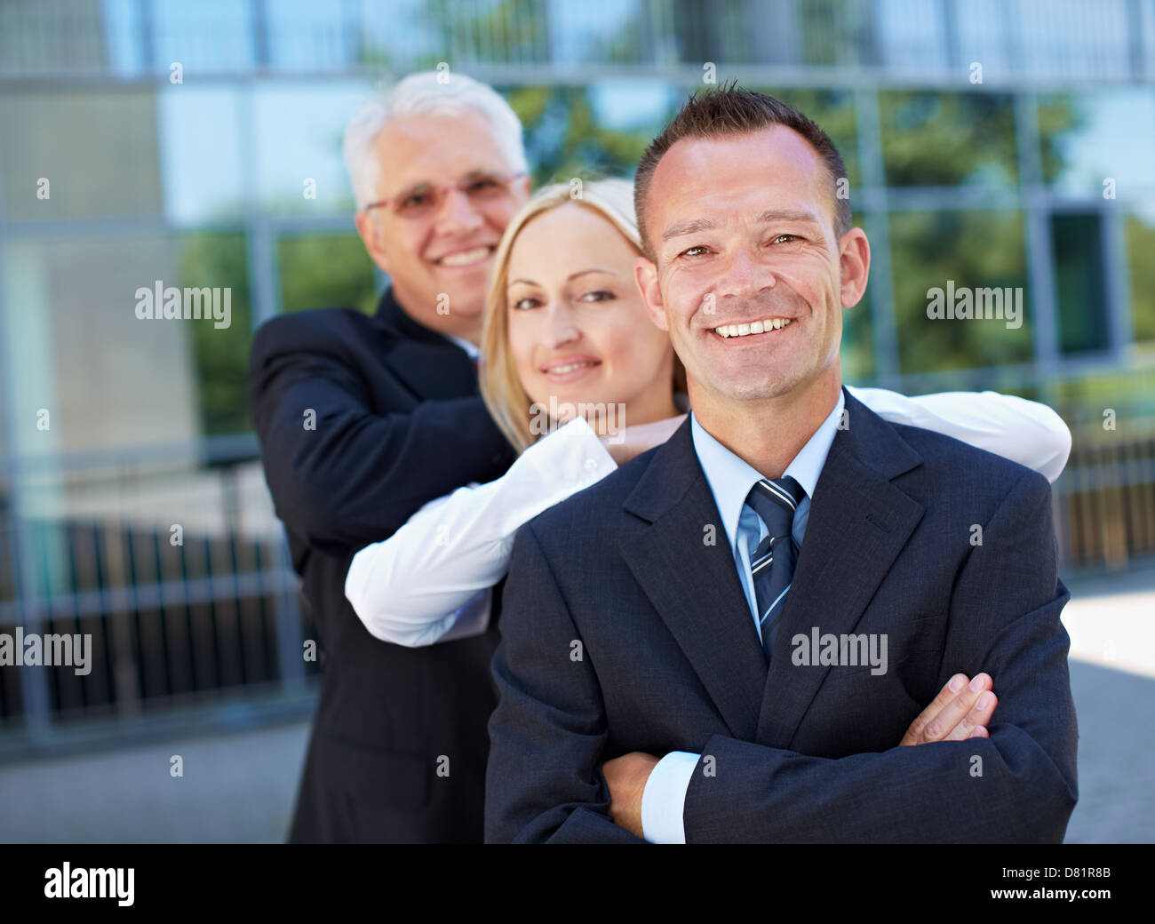 Happy business people team with smiling employees Stock Photo - Alamy