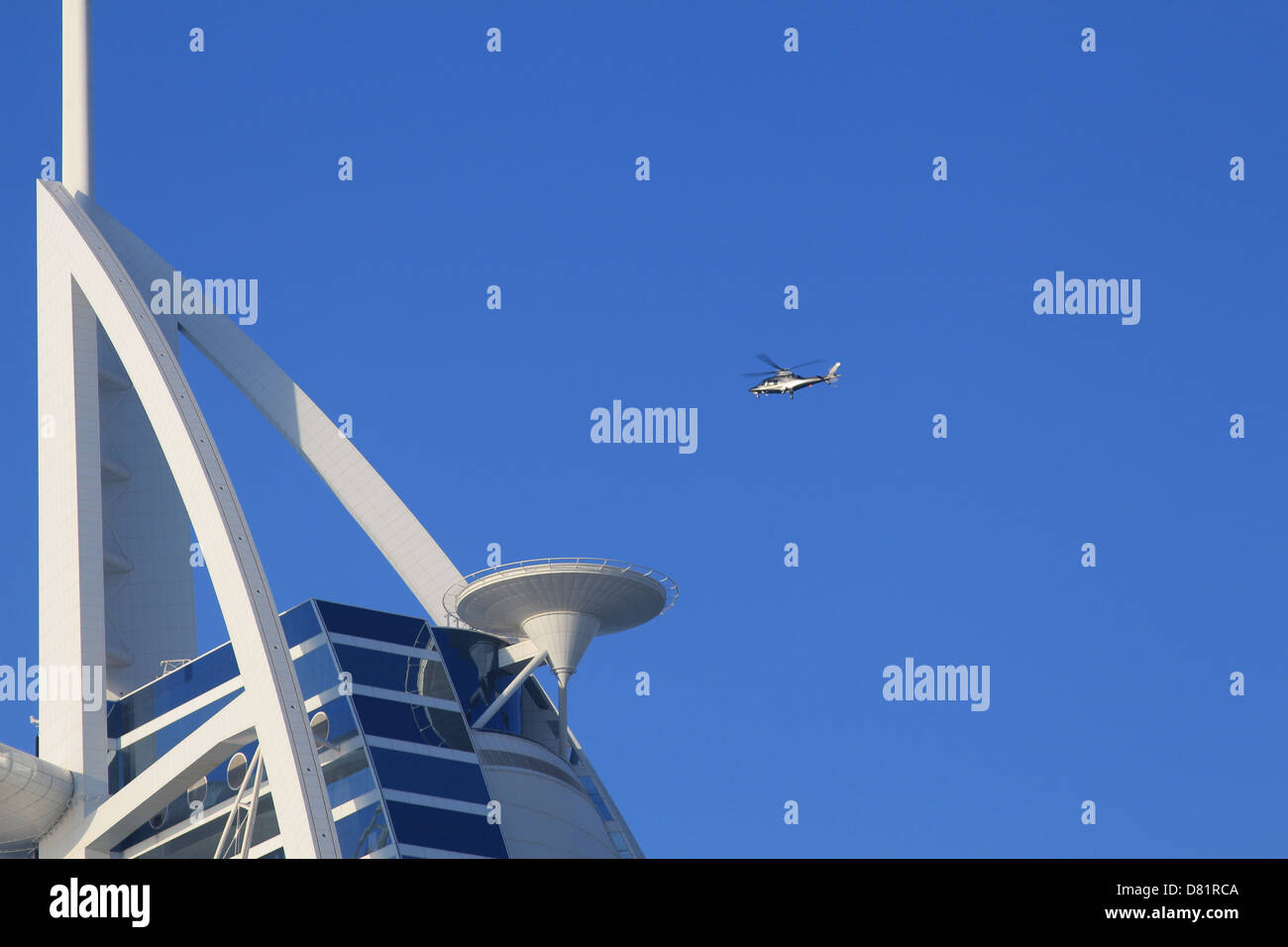 Designed to resemble a billowing sail, Burj Al Arab soars to a height ...