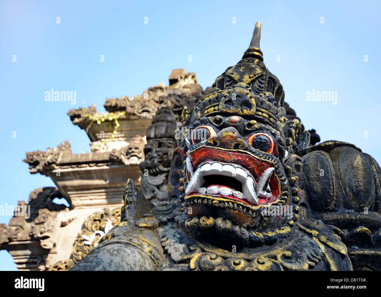 Scary stone barong mask at entrance to Tanah Lot, Bali Indonesia Stock ...