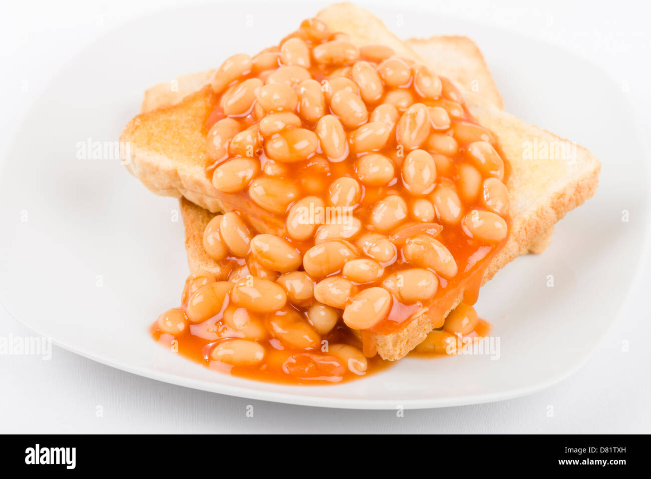 Beans on Toast - Slices of toasted white bread, buttered and topped ...