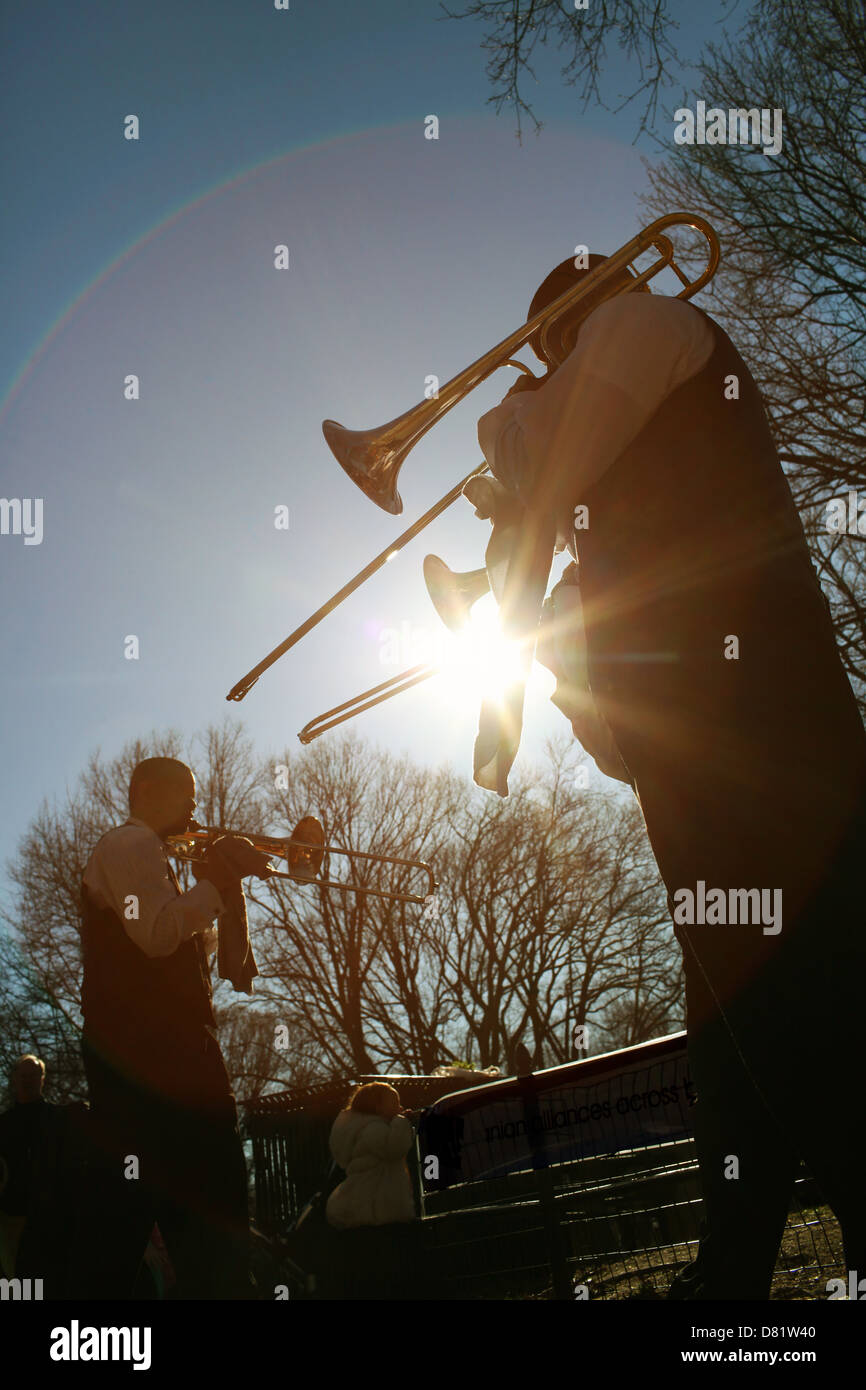 trumpet players in central park at sunset Stock Photo - Alamy