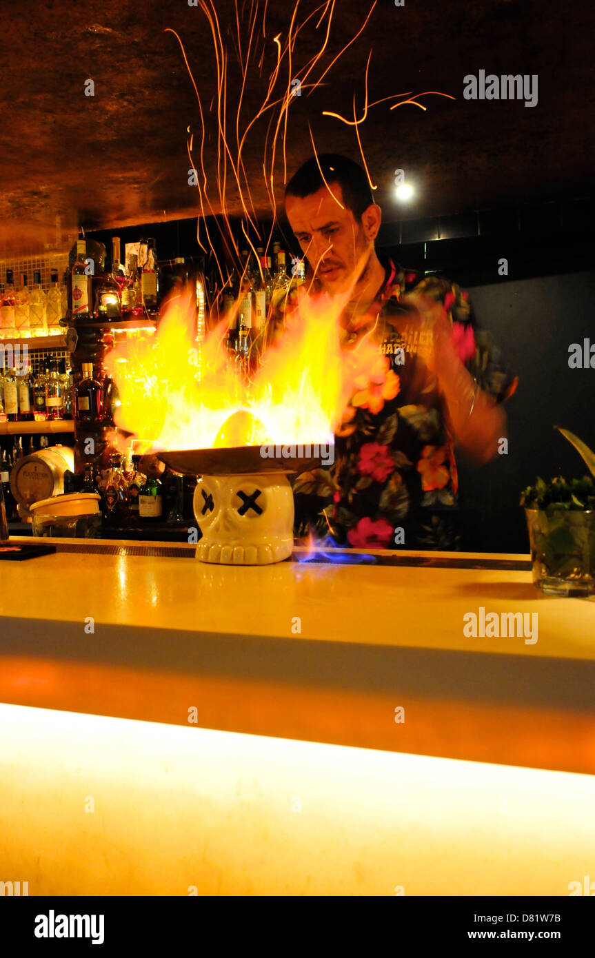 Barman making a cocktail at Trailer Happiness bar, Portobello Road ...