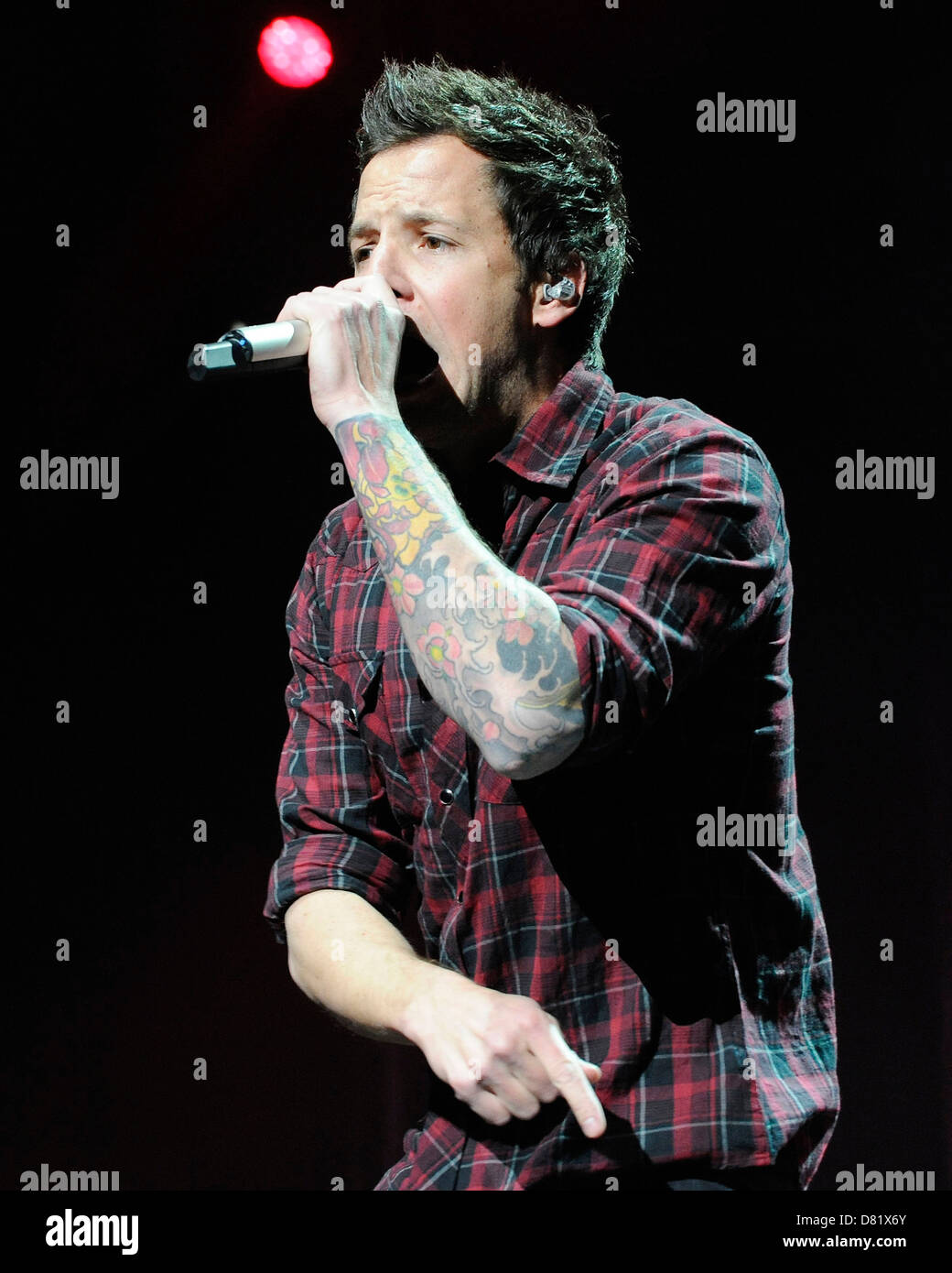 Pierre Bouvier Simple Plan performs on stage at The Air Canada Centre ...