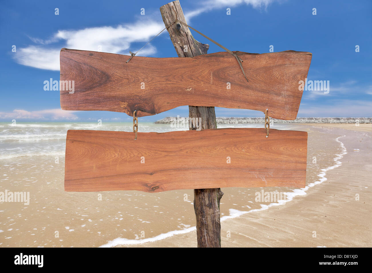 wooden signboard on tropical beach Stock Photo - Alamy
