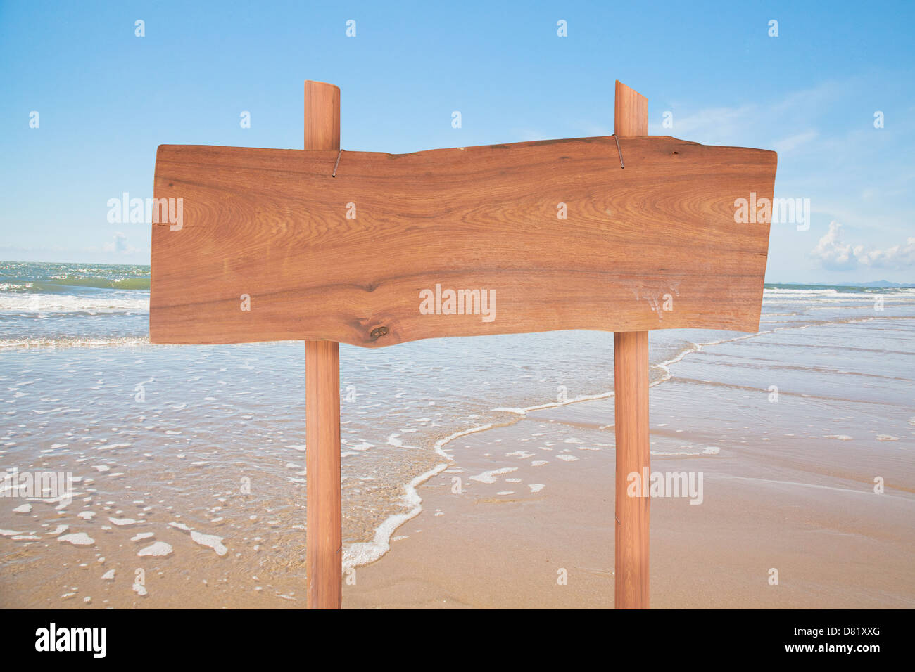 wooden signboard on tropical beach Stock Photo - Alamy