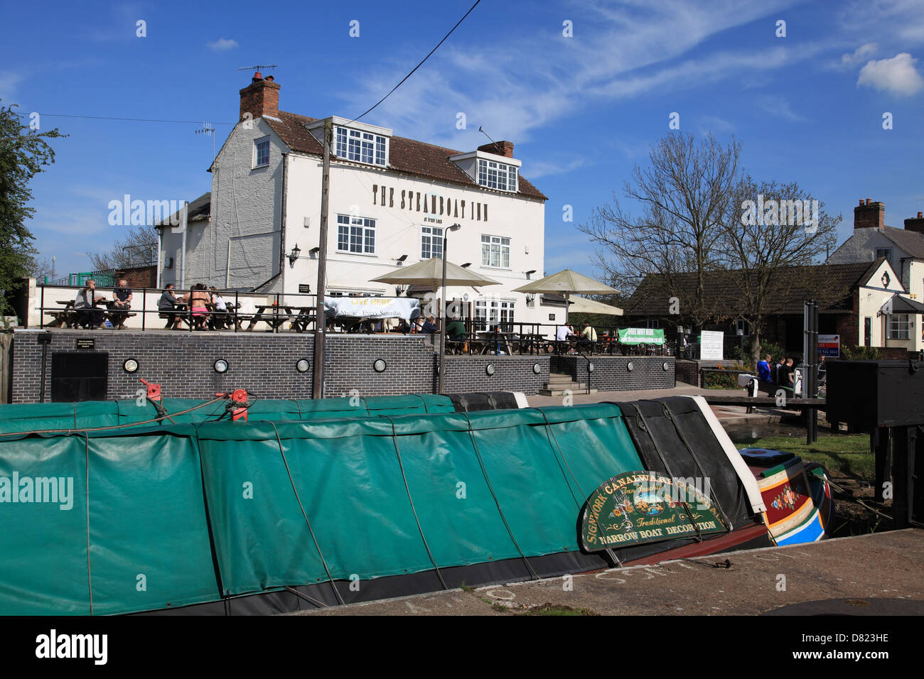 An historic narrowboat on the Erewash Canal at Trent Lock with the ...