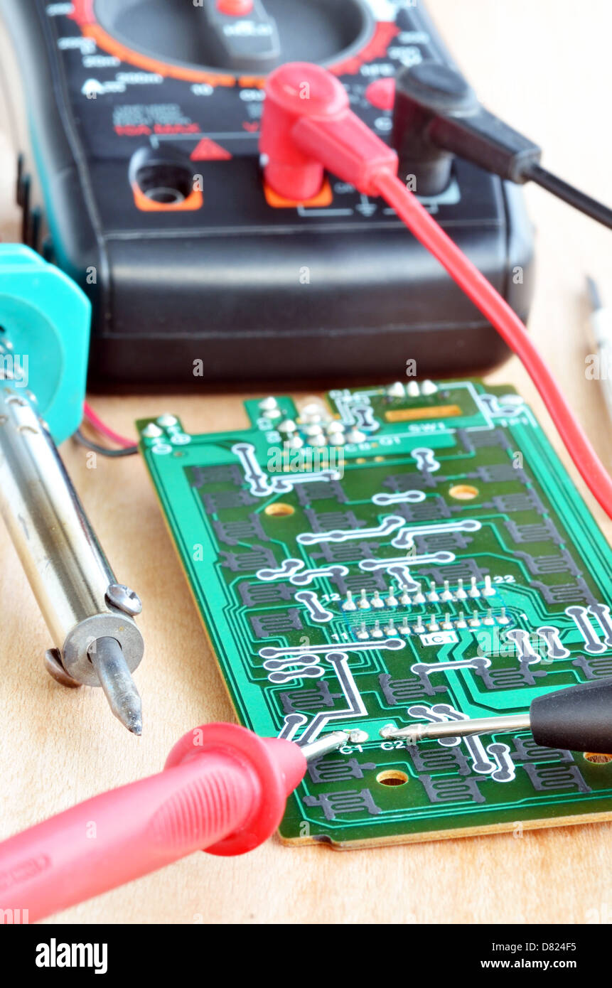 test repair job on electronic printed circuit board Stock Photo - Alamy