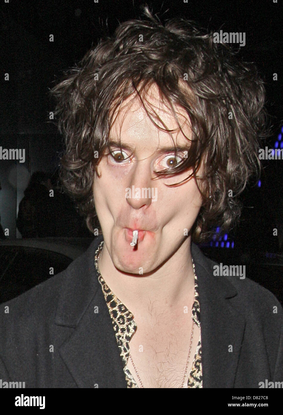 A scruffy looking friend of Caroline Flack makes a face for the camera ...