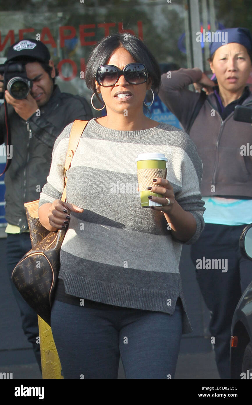 Nia Long returns to her car after shopping for groceries at Wholefoods ...