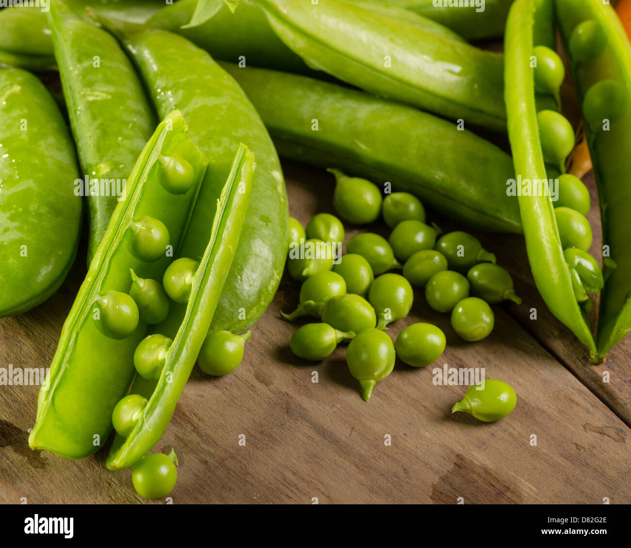 Freshly harvested shelled green peas Stock Photo - Alamy