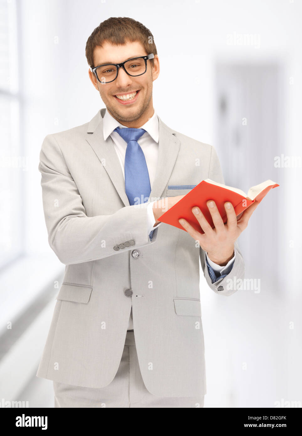 happy man with book Stock Photo - Alamy