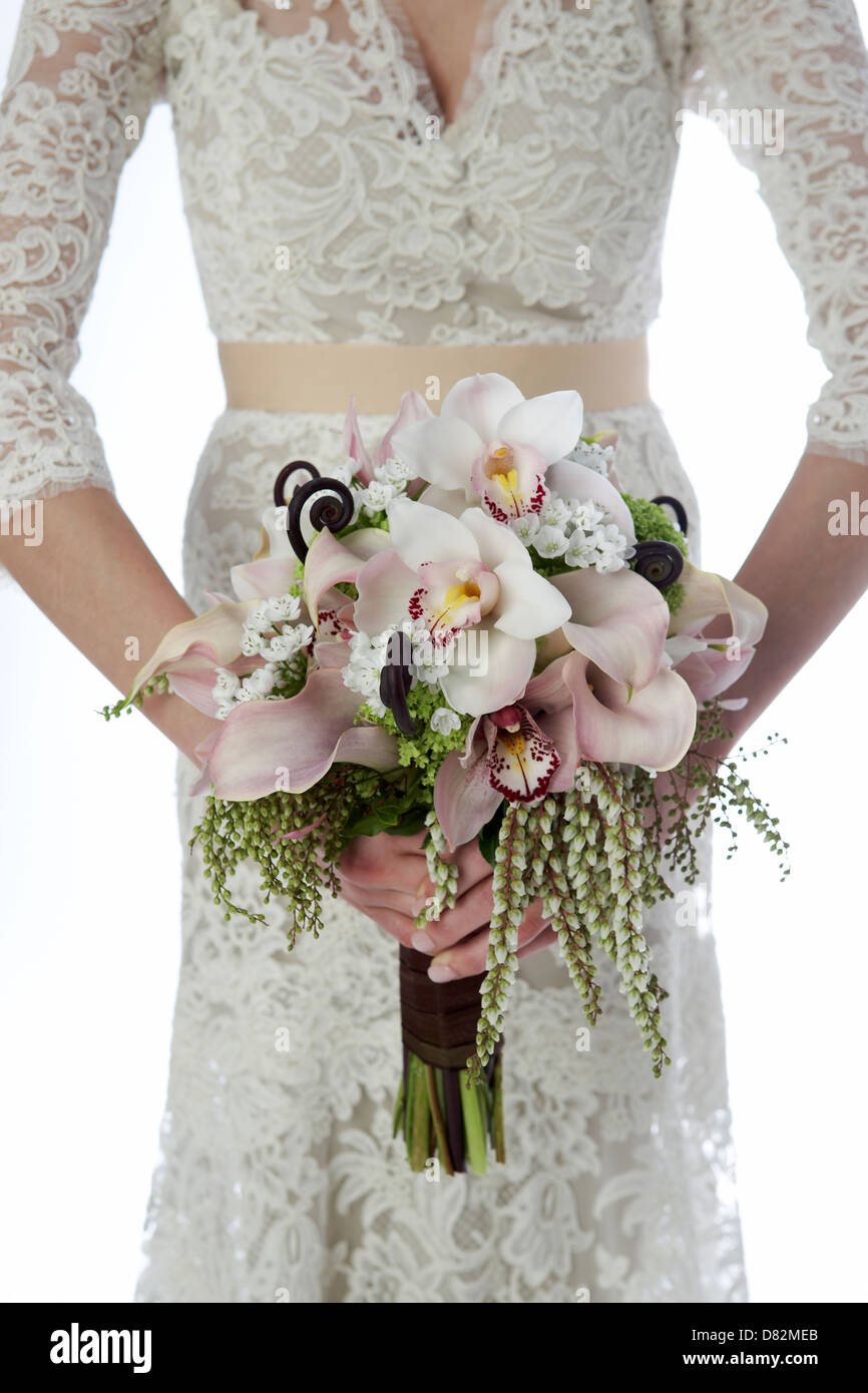 Bride holding bridal bouquet Stock Photo - Alamy