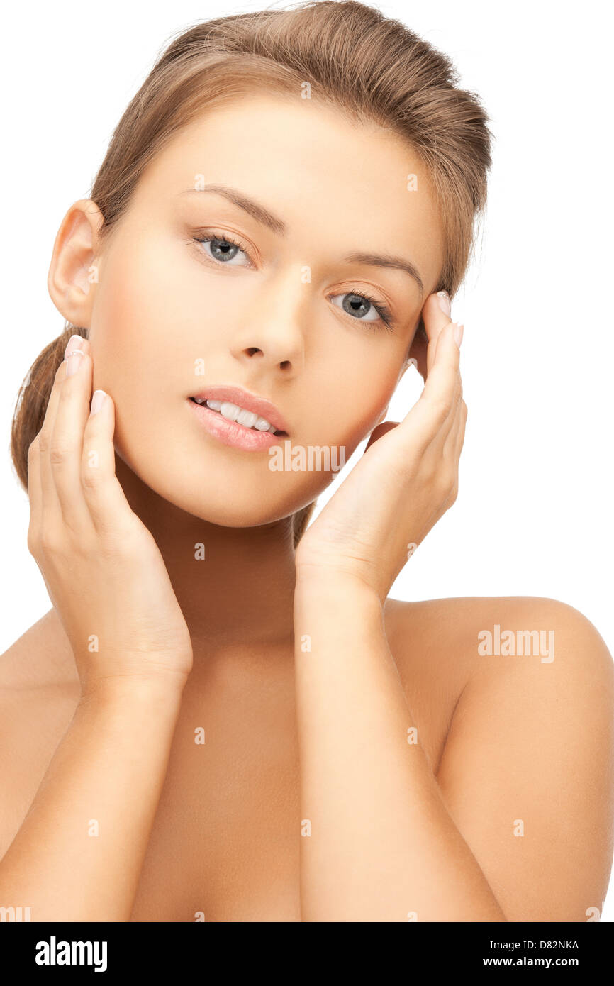 woman touching her face Stock Photo - Alamy