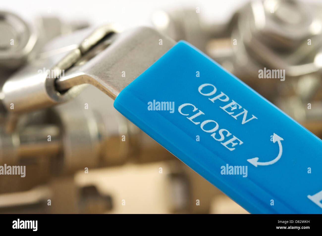 Close up of stainless steel valve handle with open close label Stock ...