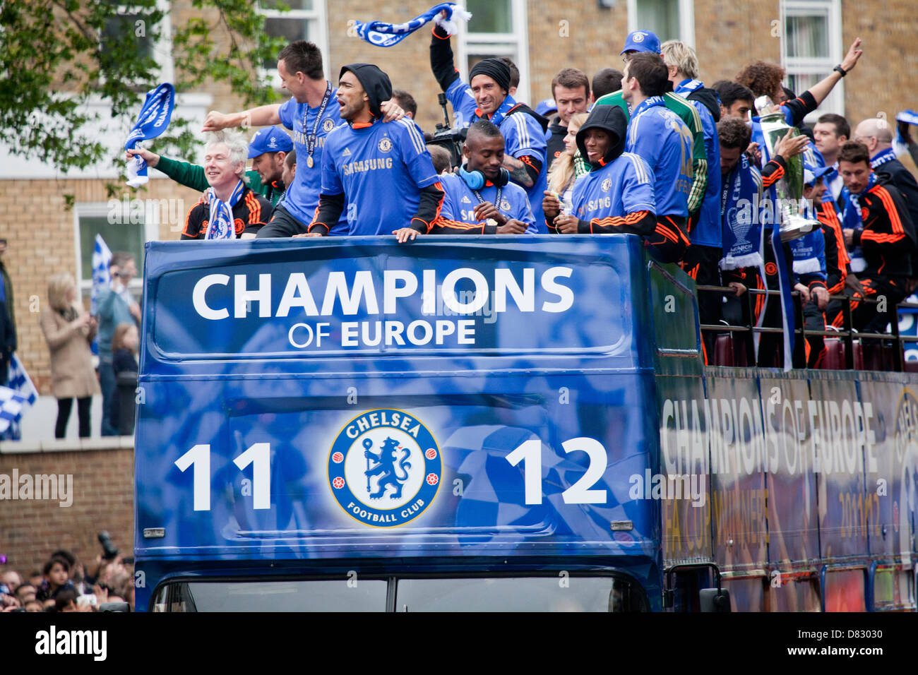 Chelsea Fans watch as the Chelsea footballers, celebrate on a bus in ...