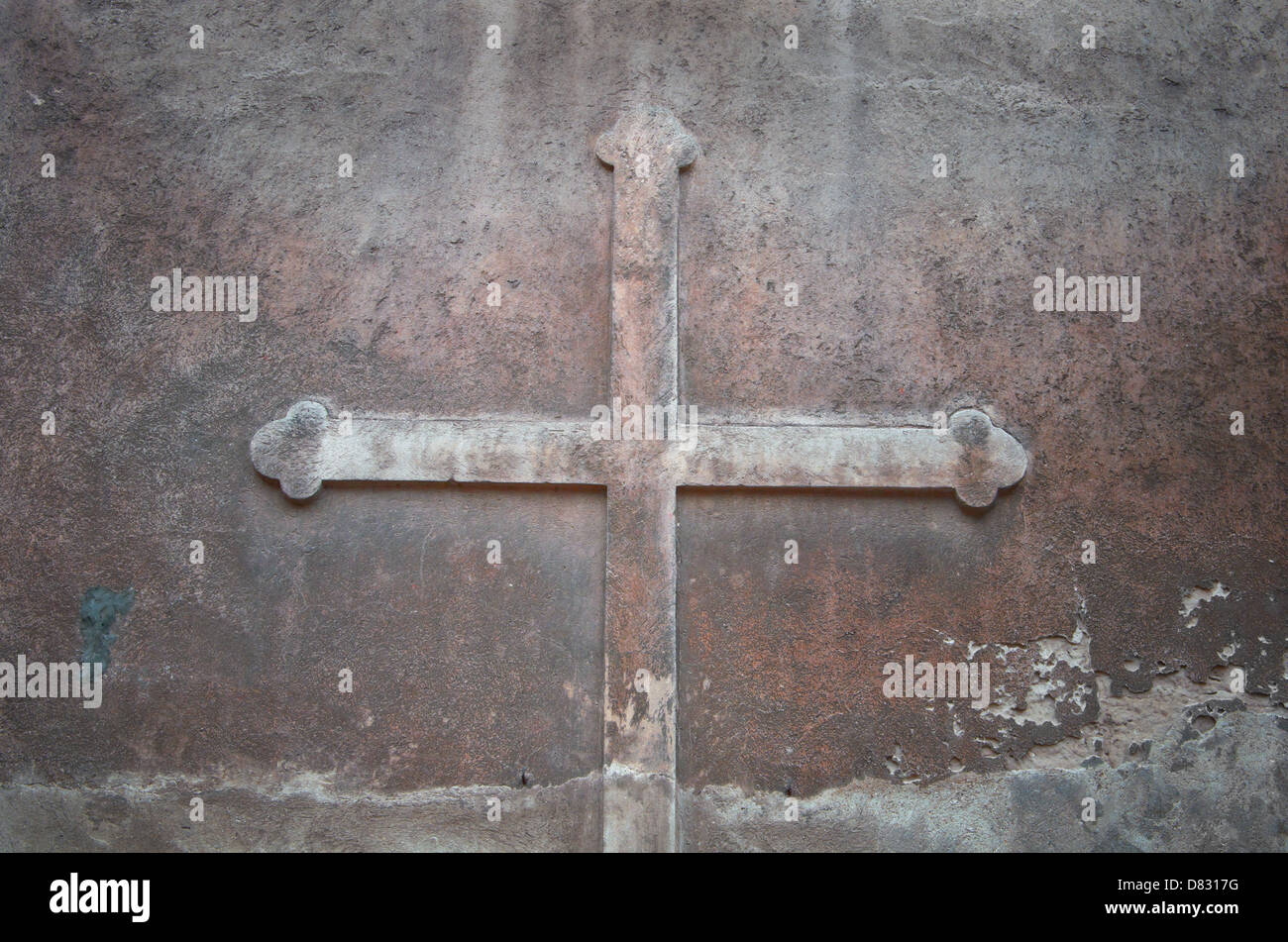 Stone cross on old church wall Stock Photo - Alamy