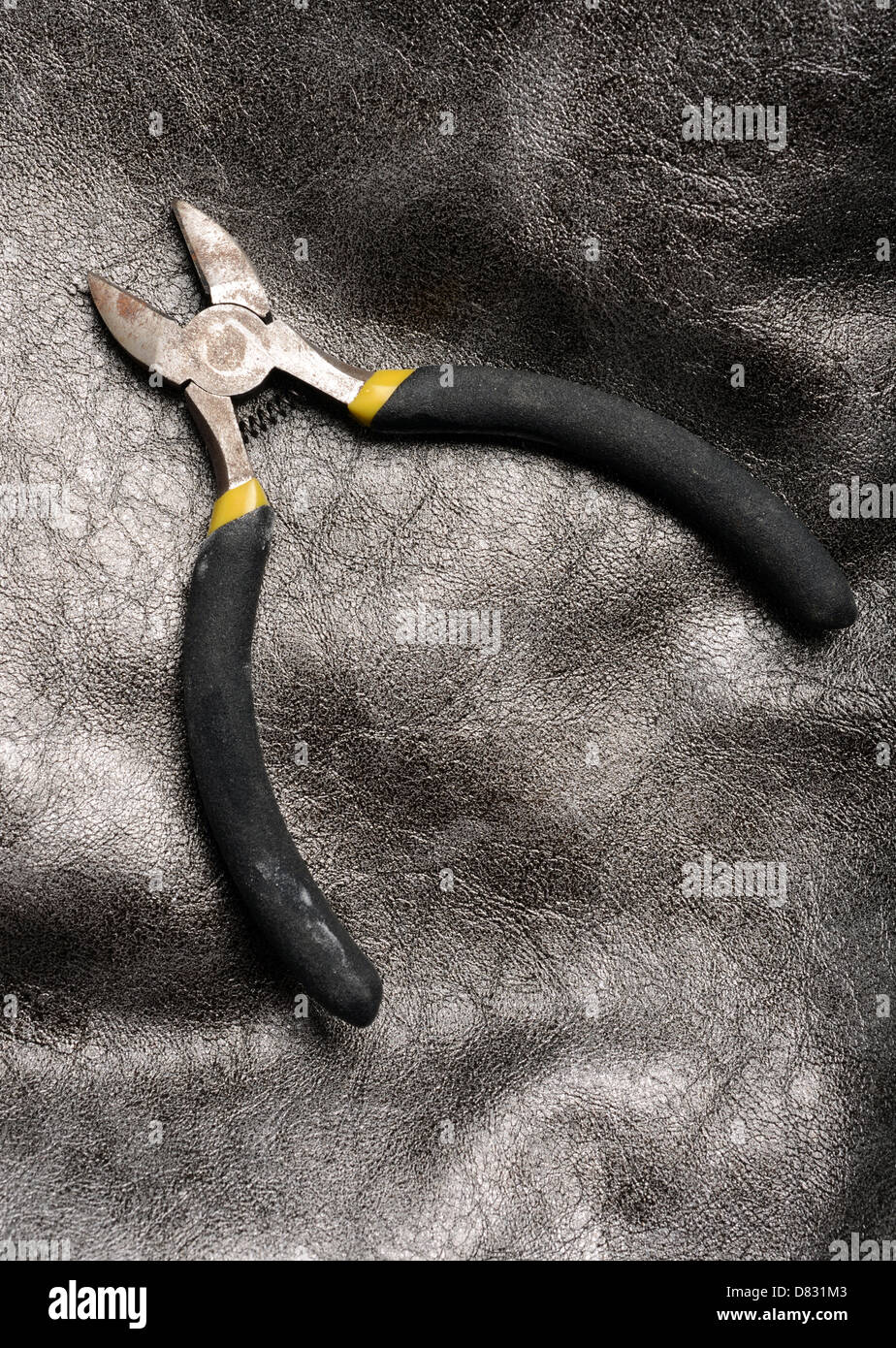 wire snips on gray background with nobody Stock Photo - Alamy