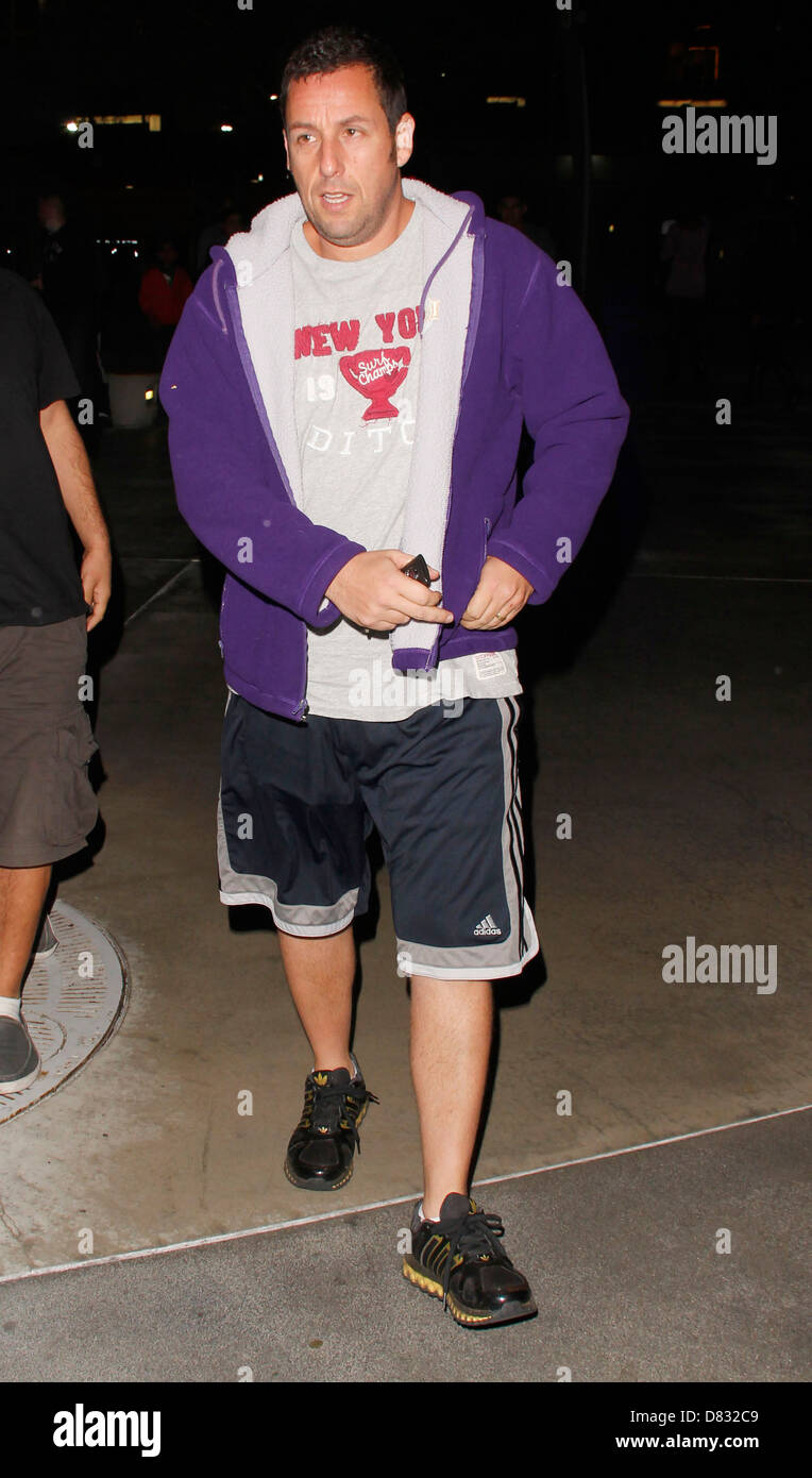 Adam Sandler arrives at the Staples Center for the Los Angeles Lakers ...