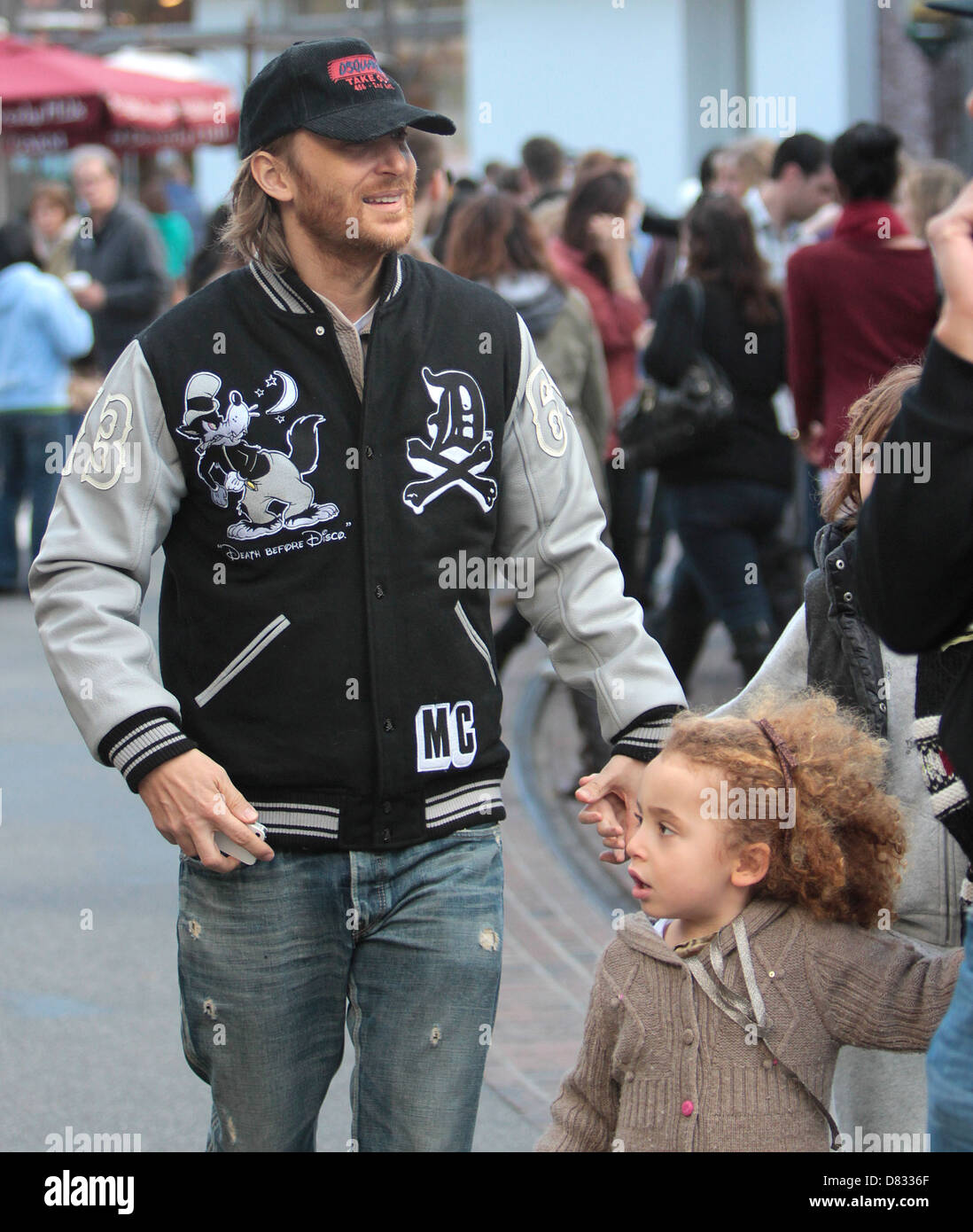 Music producer and DJ, David Guetta wearing a jacket with Disney's Big ...
