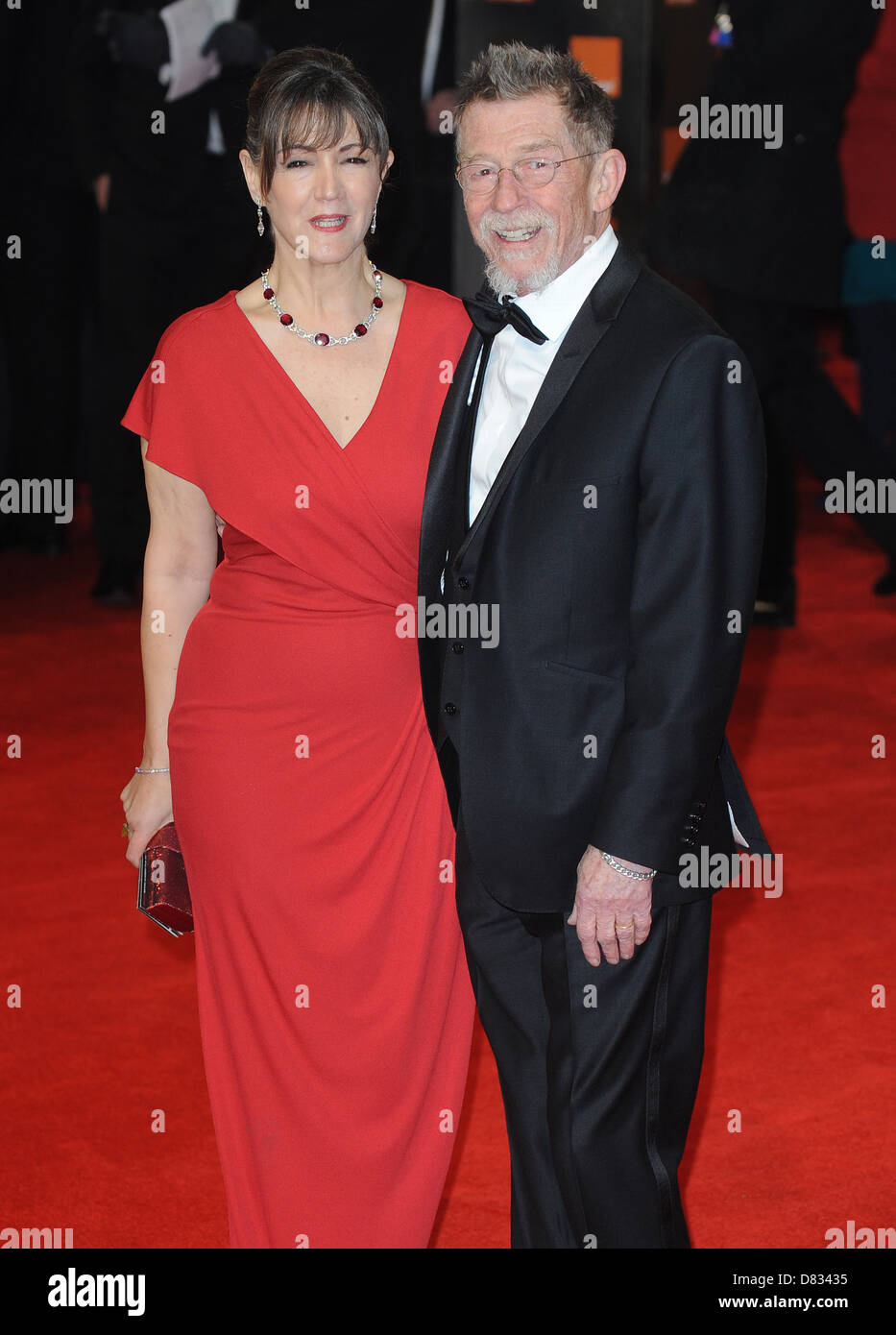 John Hurt and Ann Rees Meyers arriving at the British Academy Film ...